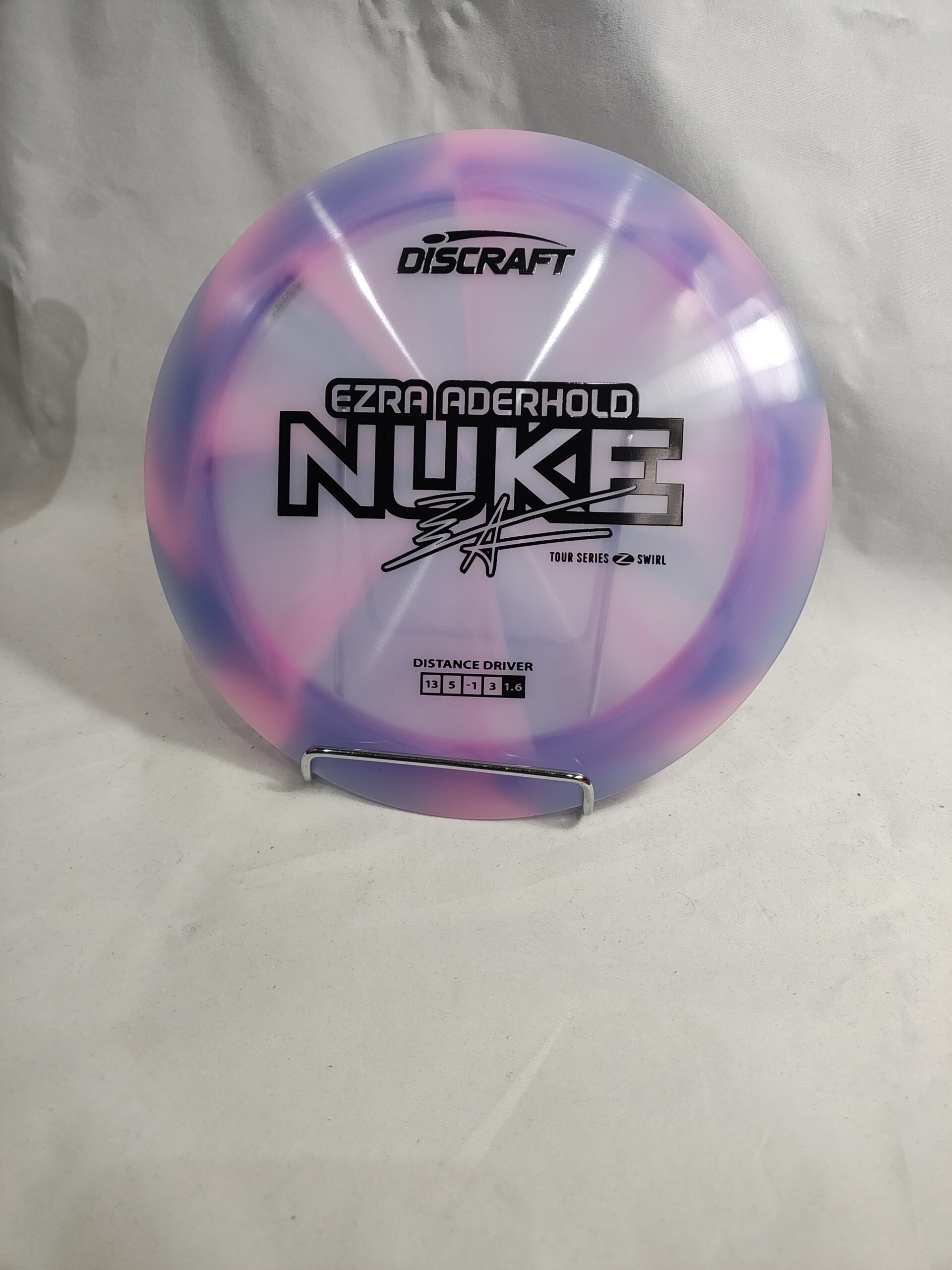 Discraft Nuke - 2025 Ezra Aderhold Tour Series Z Swirl 173-174g (Purple ...